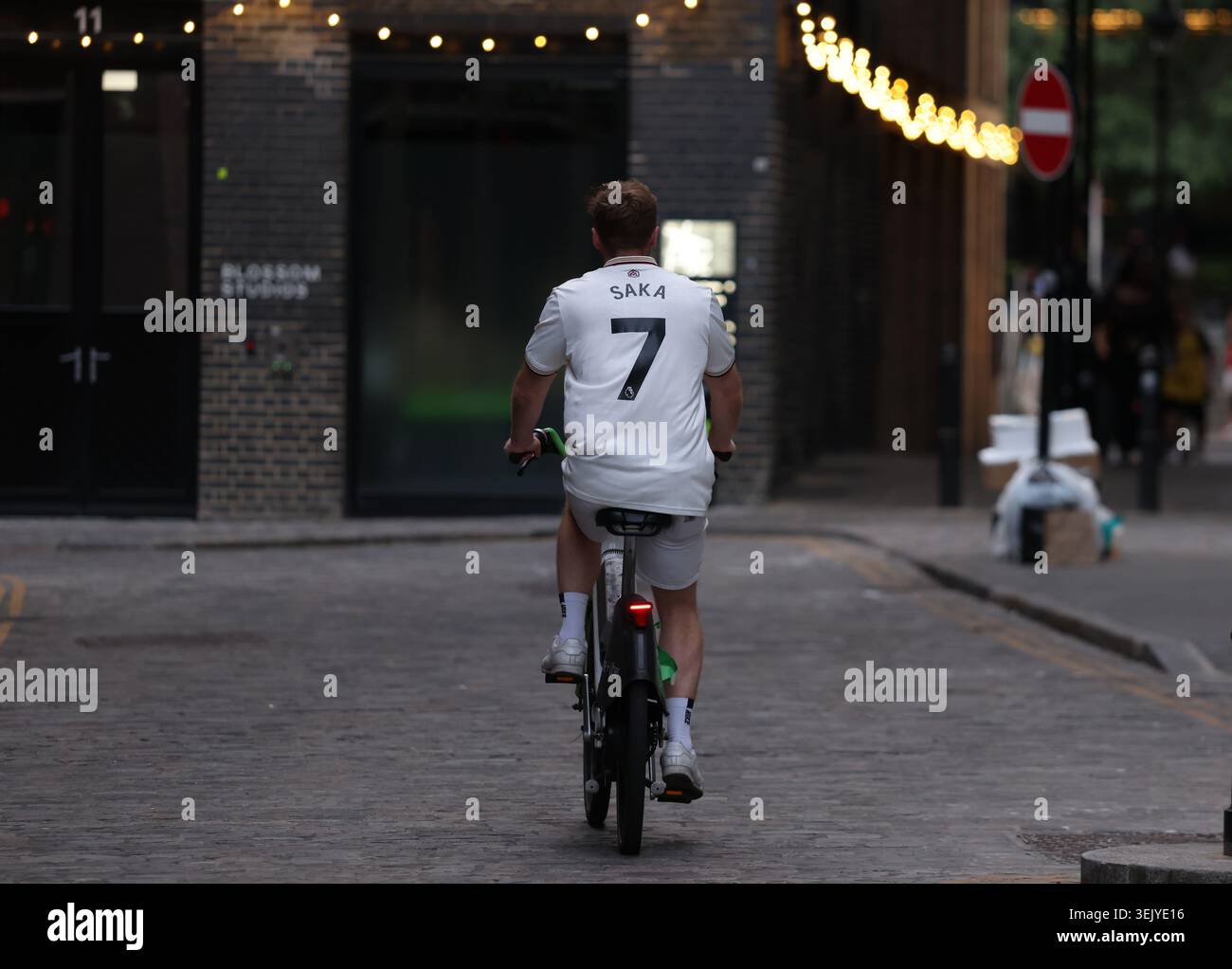 An Arsenal fan leaves after losing during a screening of the UEFA ...
