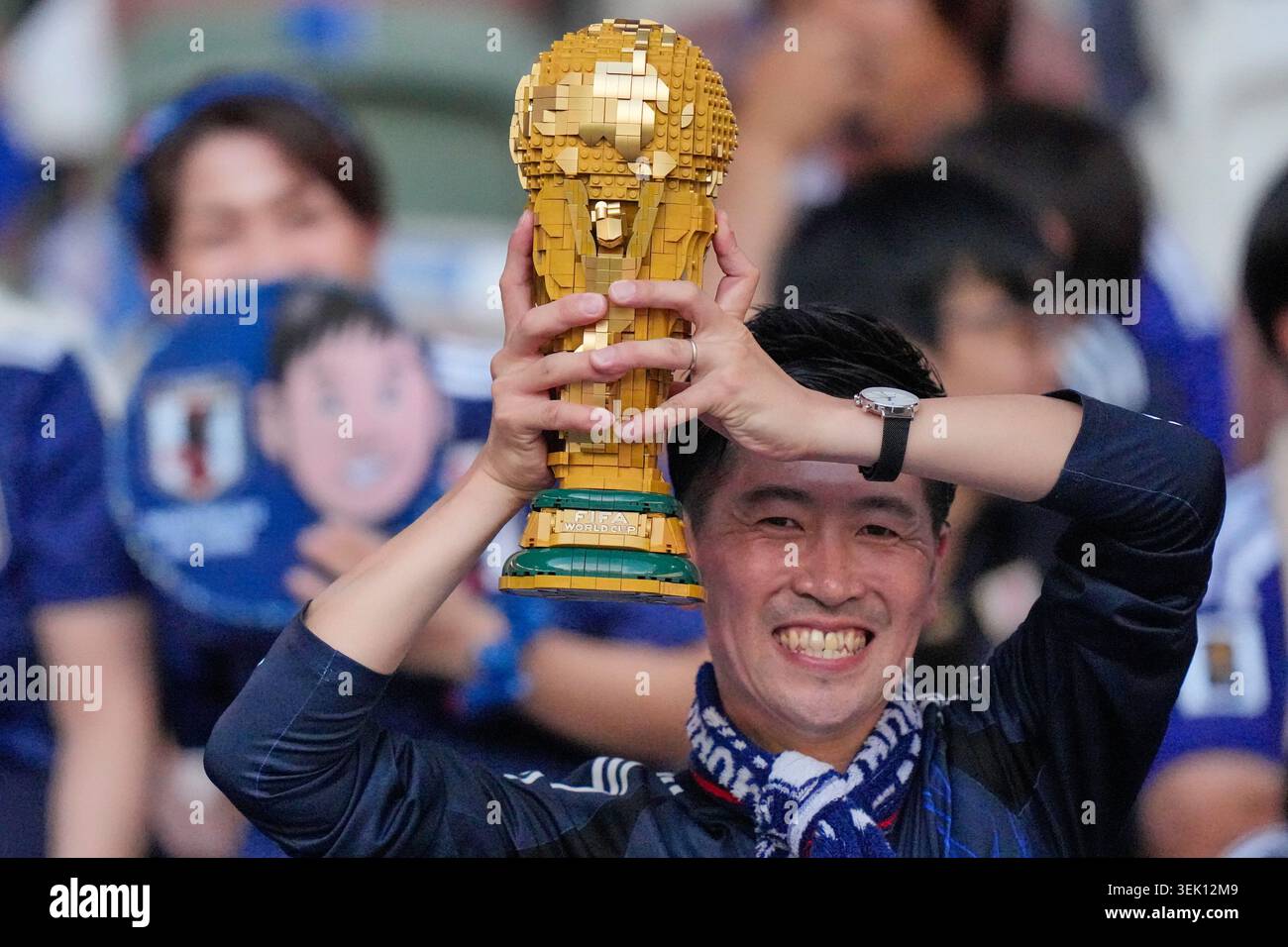 A Japanese fan reacts ahead of the friendly soccer international ...