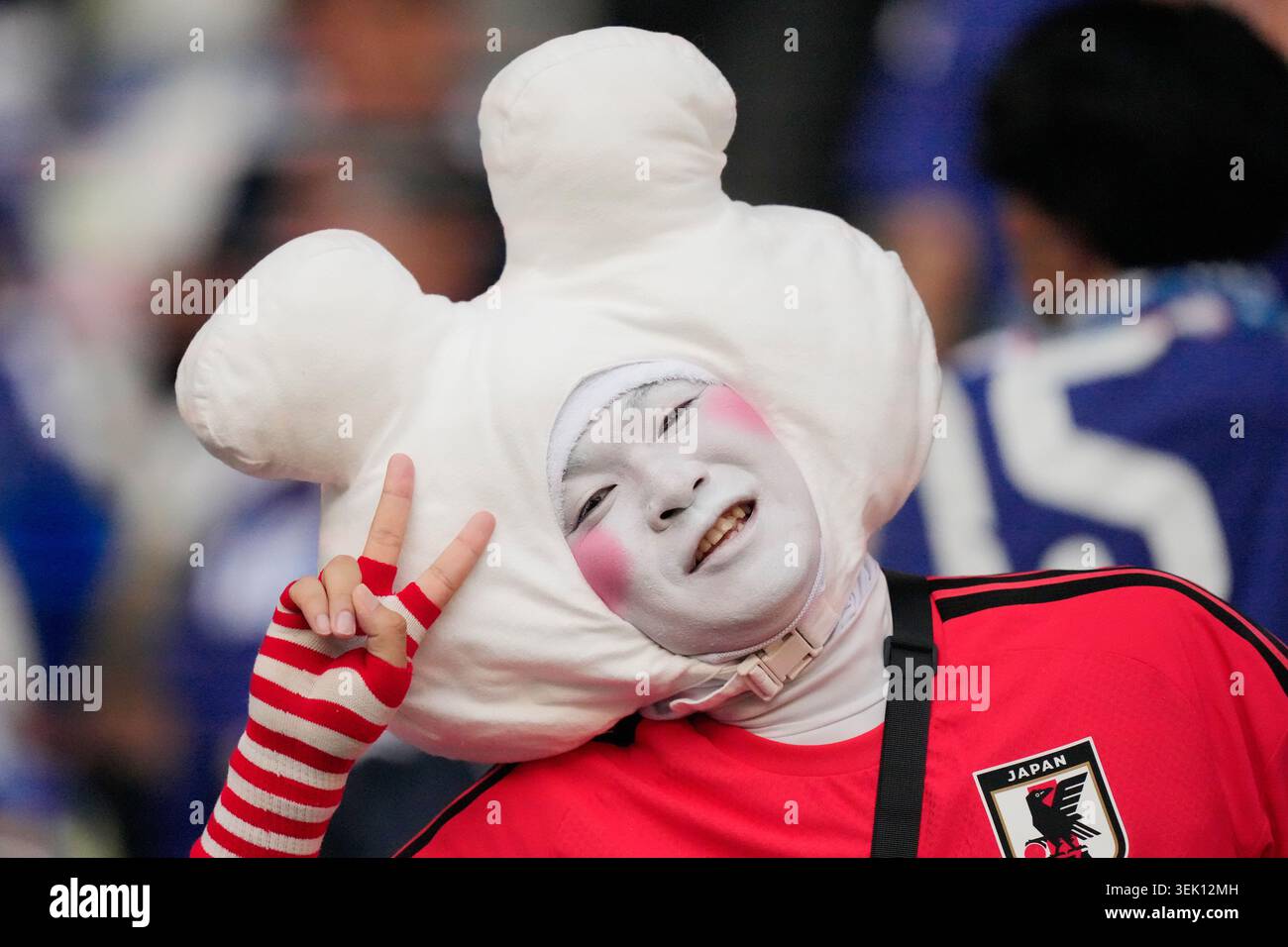 A Japanese fan reacts ahead of the friendly soccer international ...