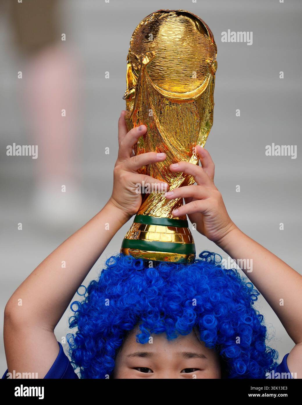 A Japanese fan reacts ahead of the friendly soccer international ...