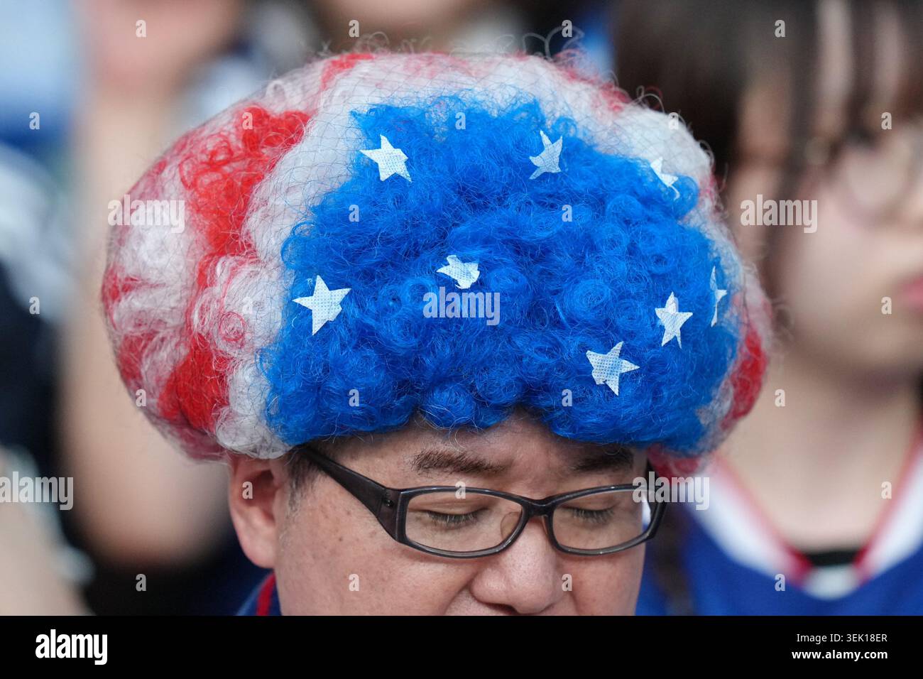 A Japanese fan reacts ahead of the friendly soccer international ...