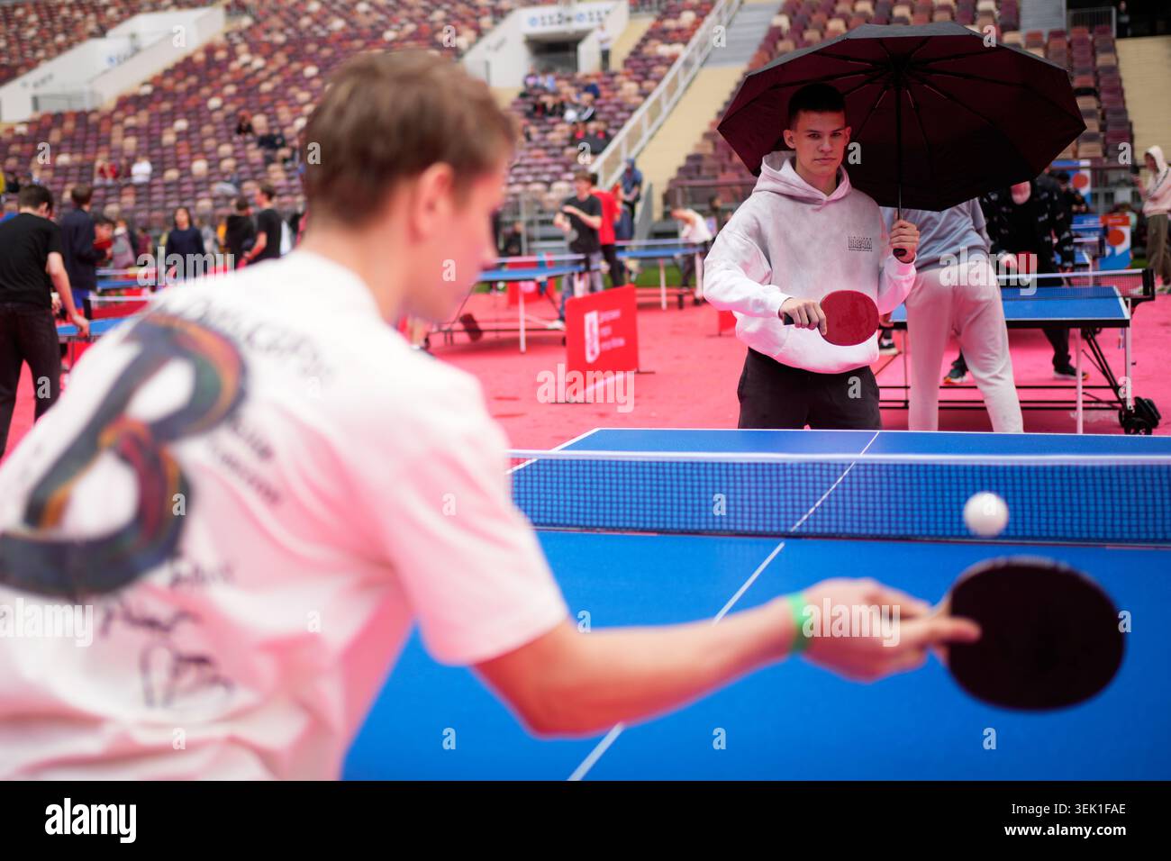 People play table tennis on the pitch of the Luzhniki Stadium during ...