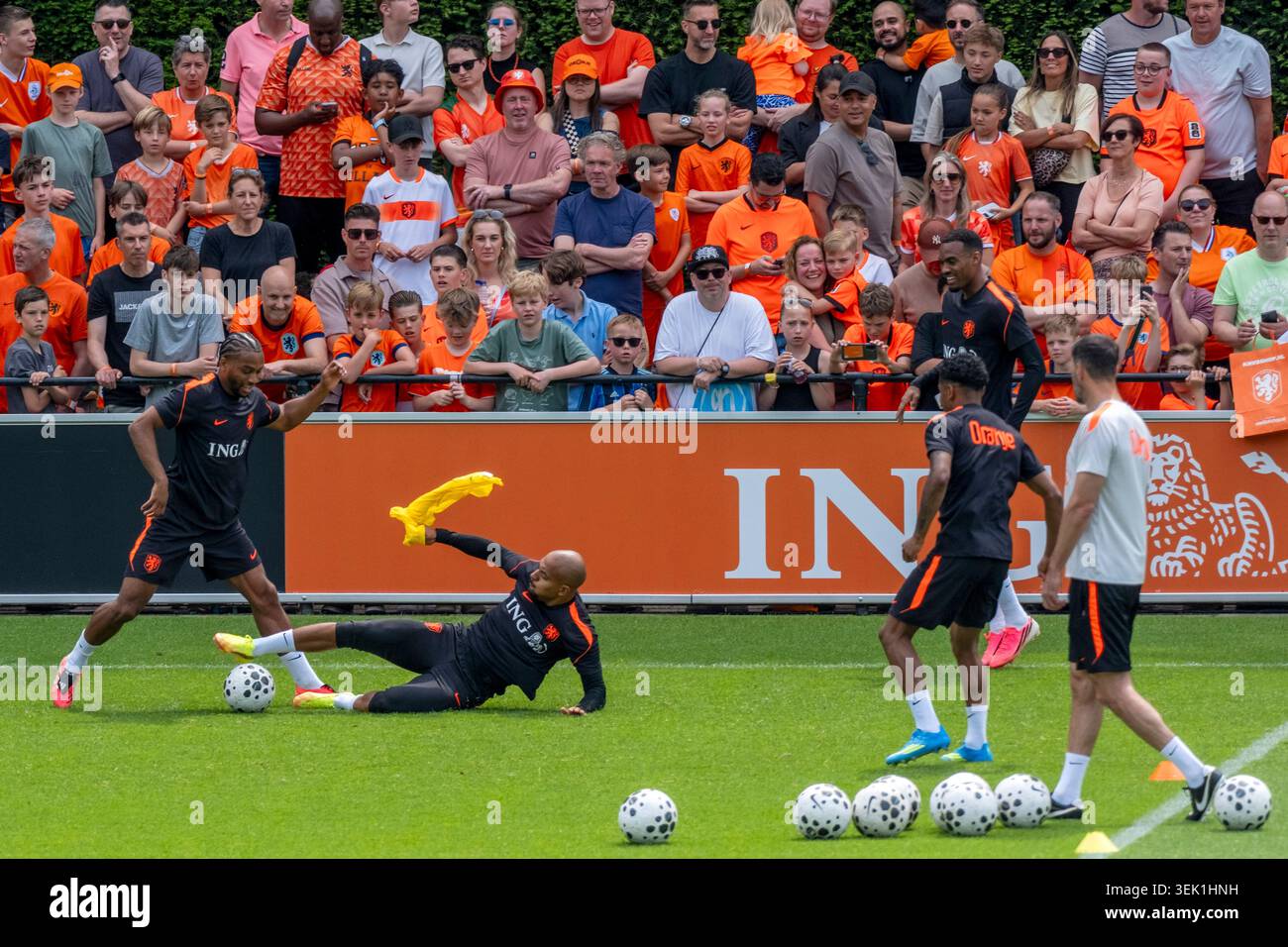 Fans enjoy watching the last practice before the World Cup soccer in ...