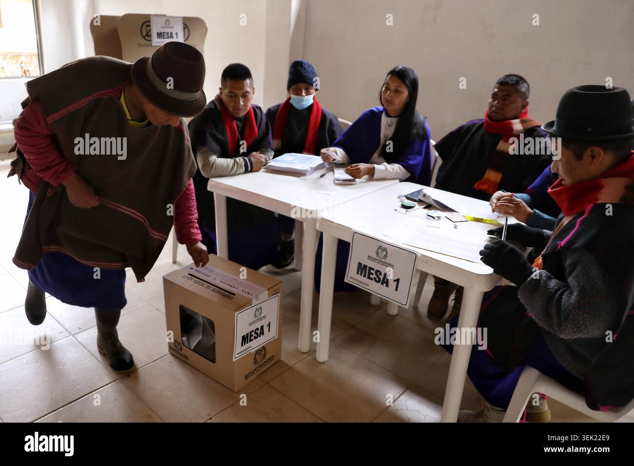 An Indigenous man votes during presidential election in Silvia ...