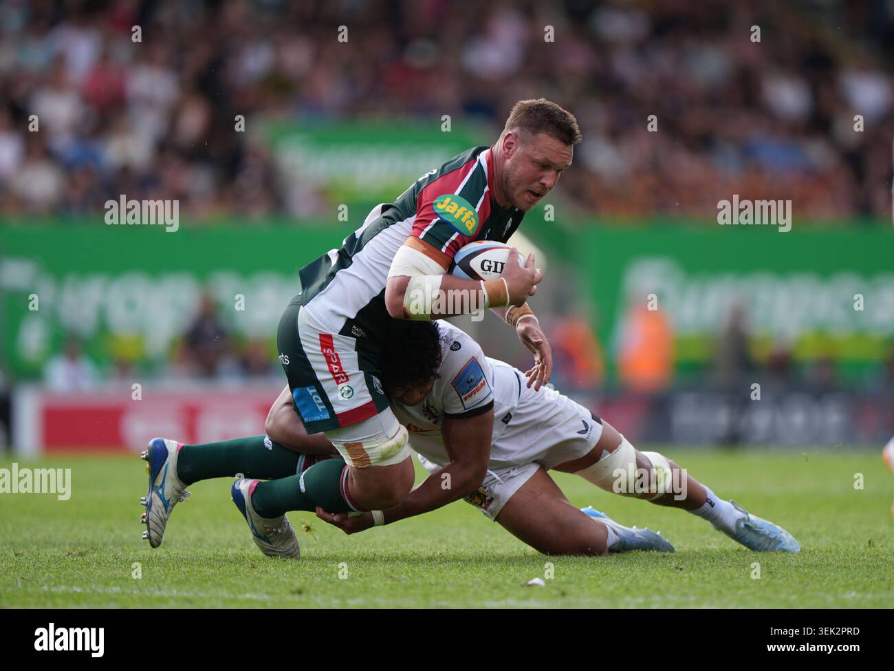 Leicester's Hanro Liebenberg is tackled by Exeter's Greg Fisilau during ...