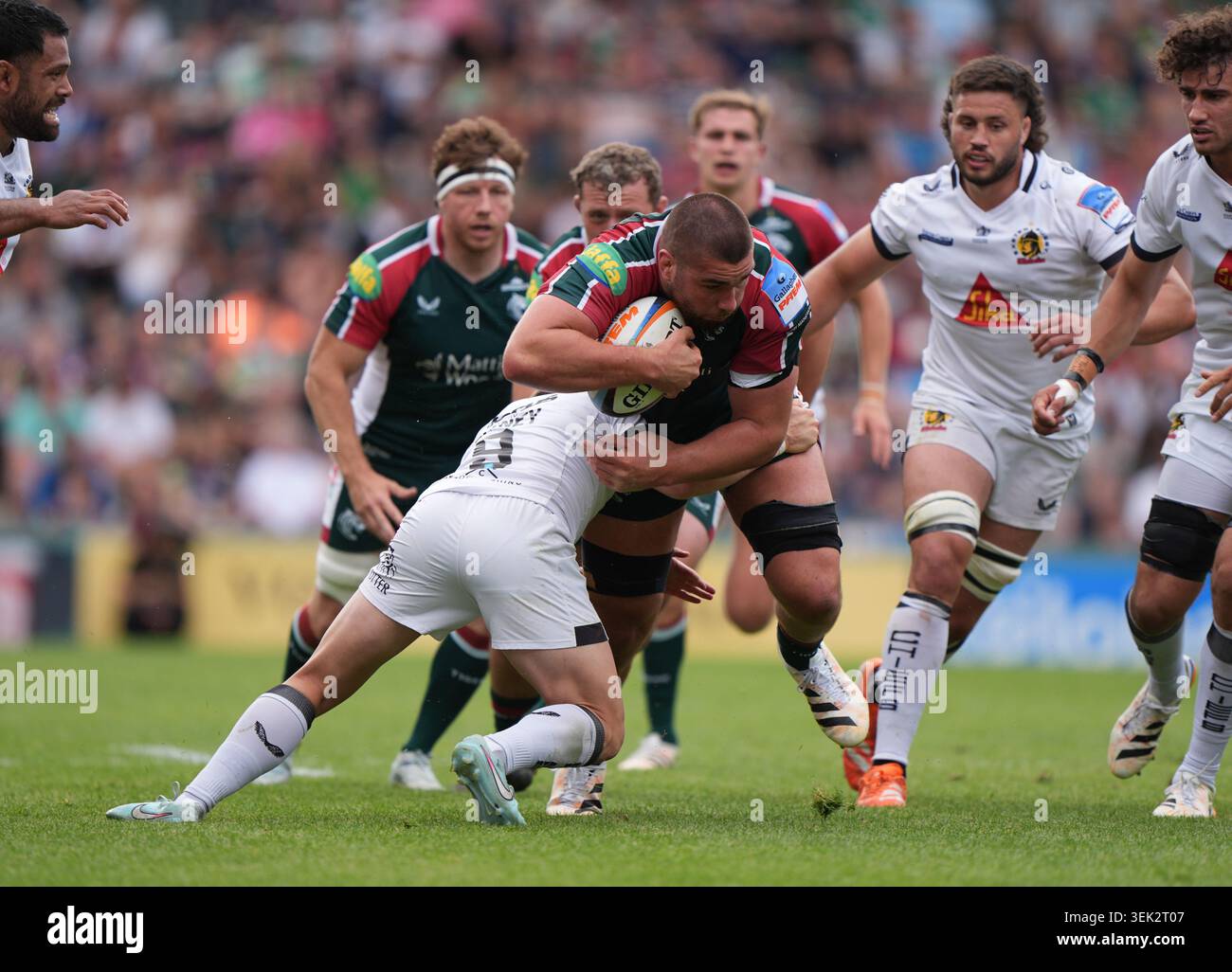 Leicester's George Martin is tackled by Exeter's Stephen Varney during ...