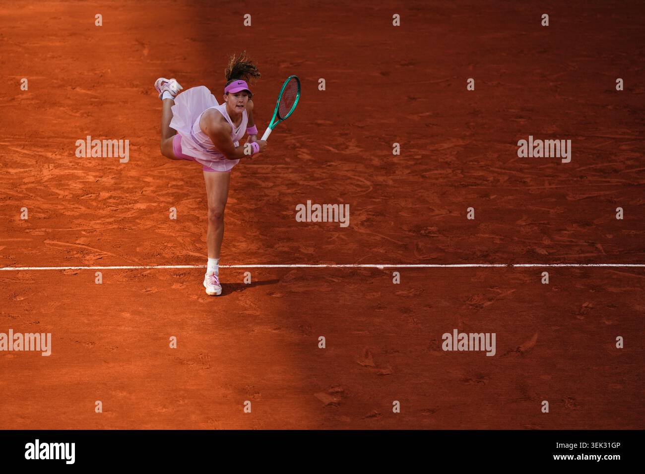 Russia's Mirra Andreeva serves to Switzerland's Jil Teichmann during ...