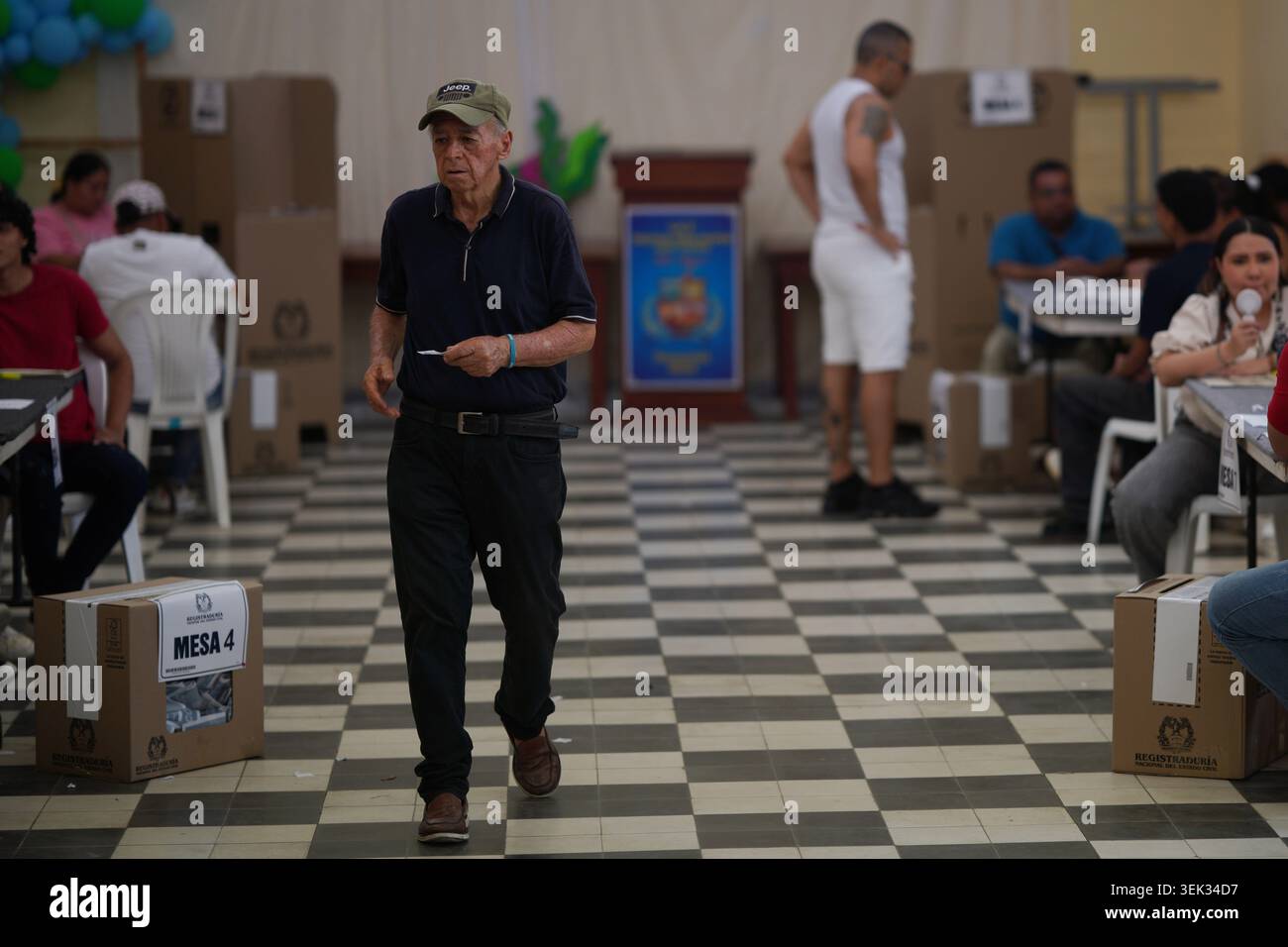 People vote during the presidential election in Puerto Colombia ...
