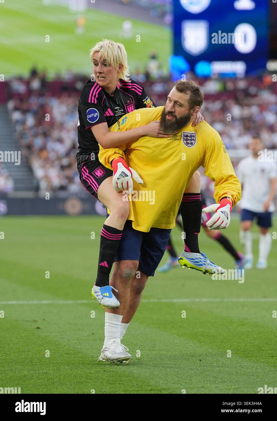 England's Joe Marler and World XI's Maisie Adam during Soccer Aid for ...