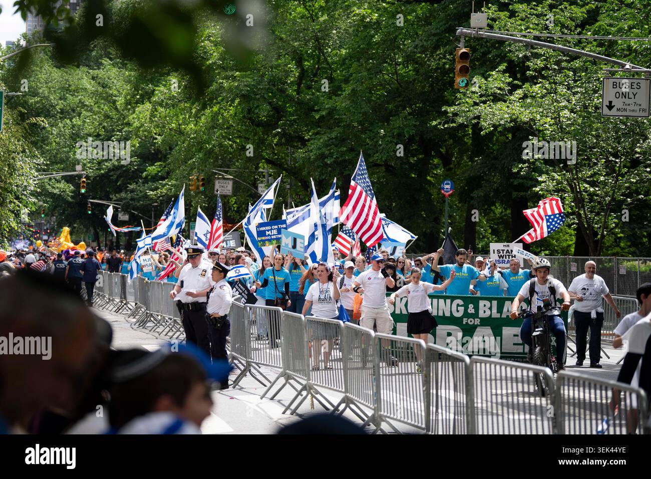 Parade participants make their way down 5th Avenue during the Israel ...