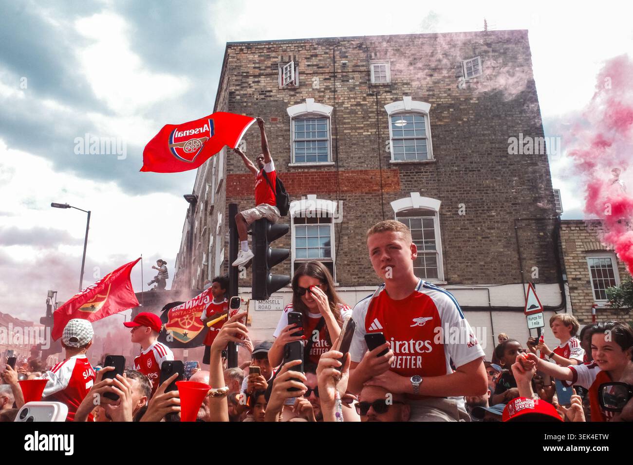 London, UK. 31st May, 2026. Arsenal supporters wave flags and let off ...