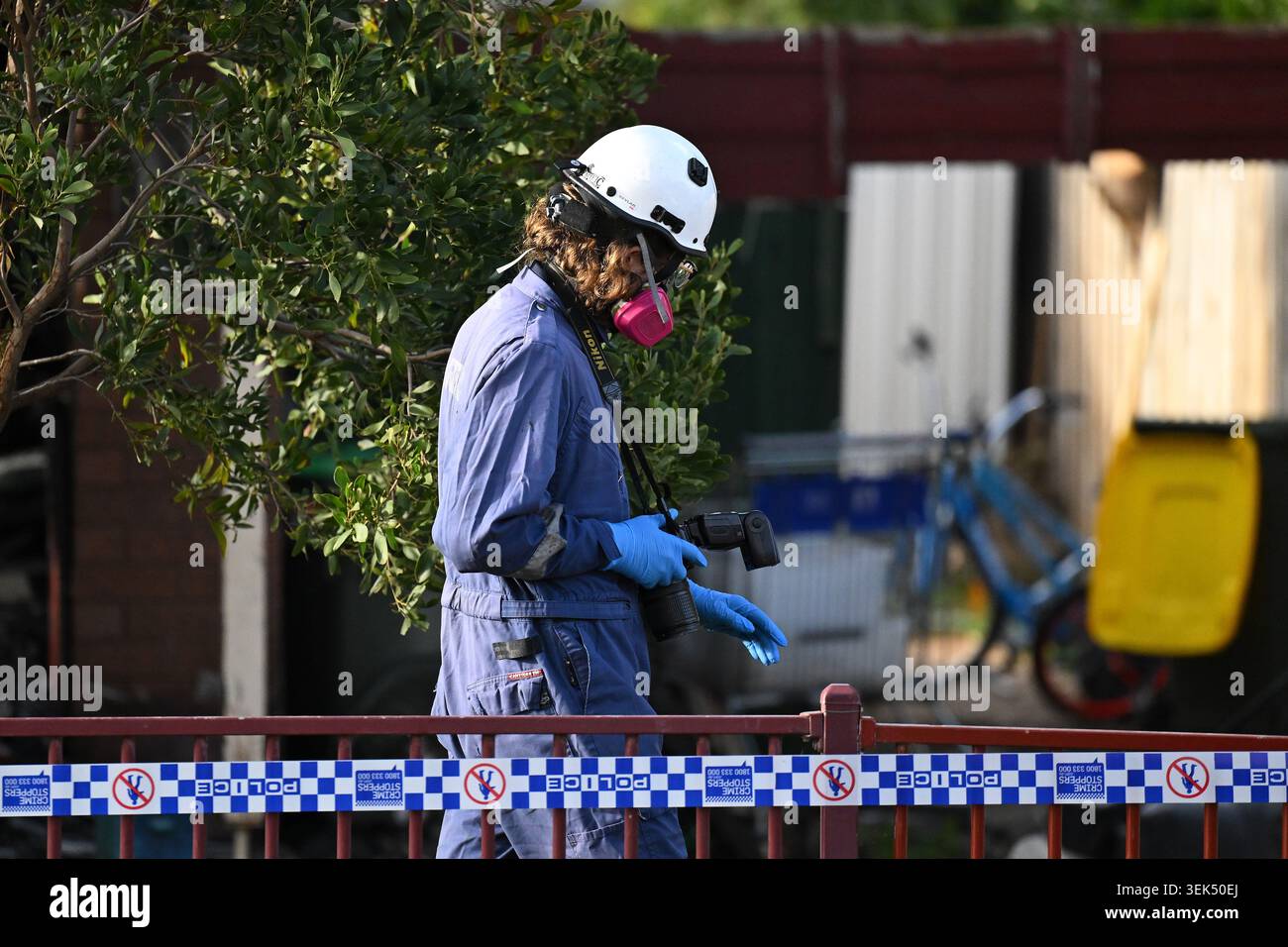 Victoria Police Forensics personnel at work at the scene of a fatal ...