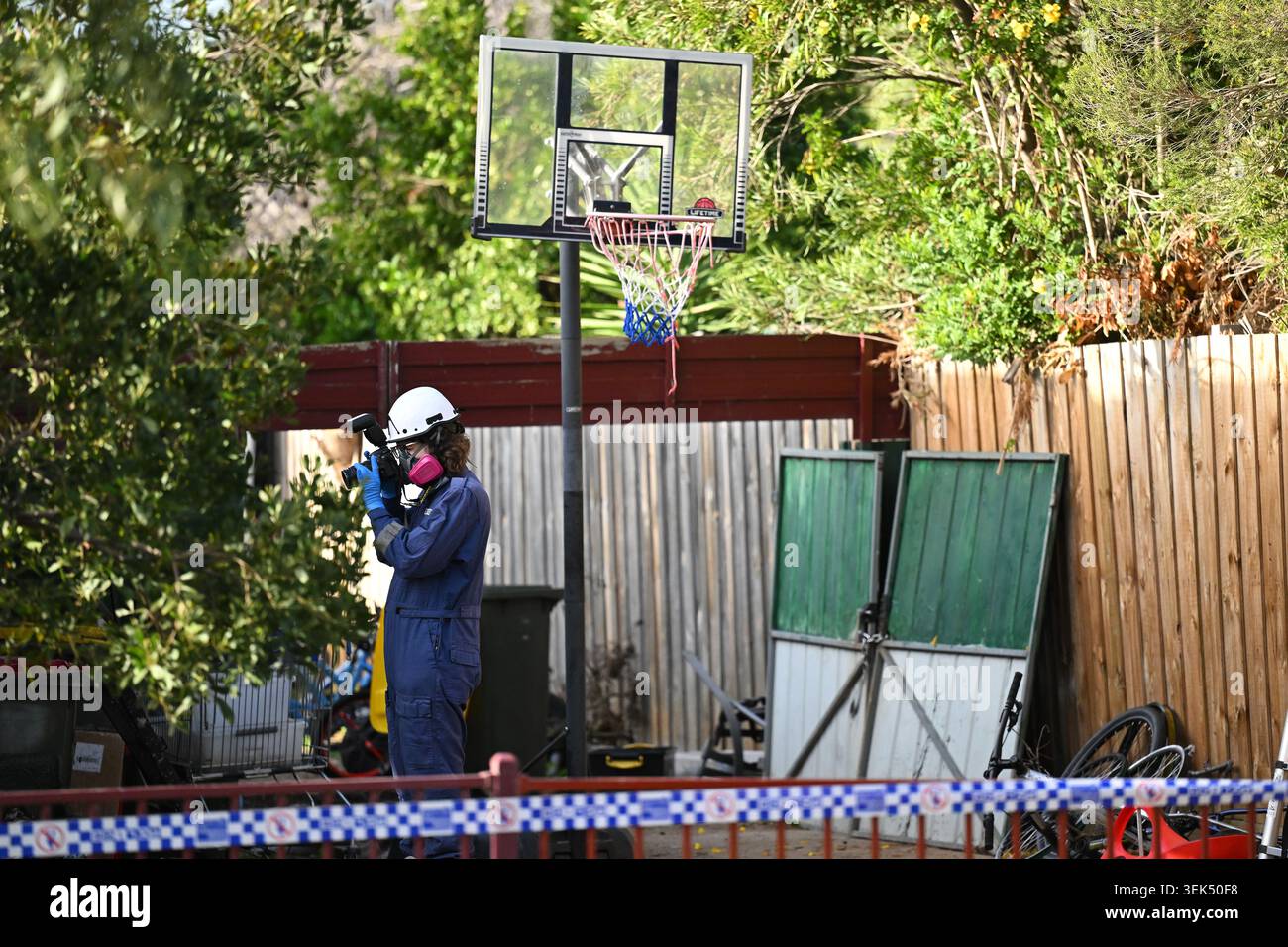 Victoria Police Forensics personnel at work at the scene of a fatal ...