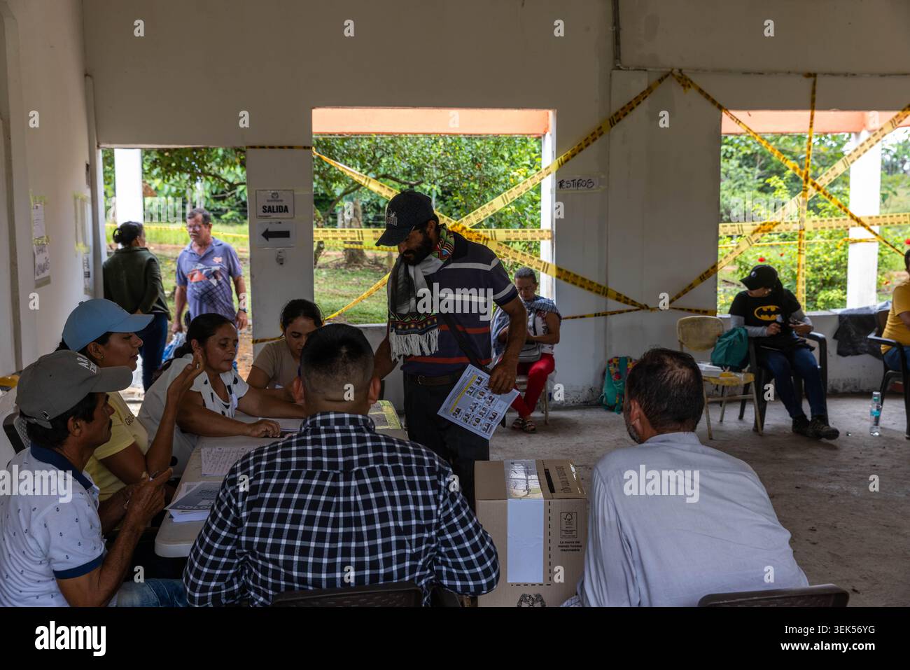A peasant gets the card to vote during the first round of the ...