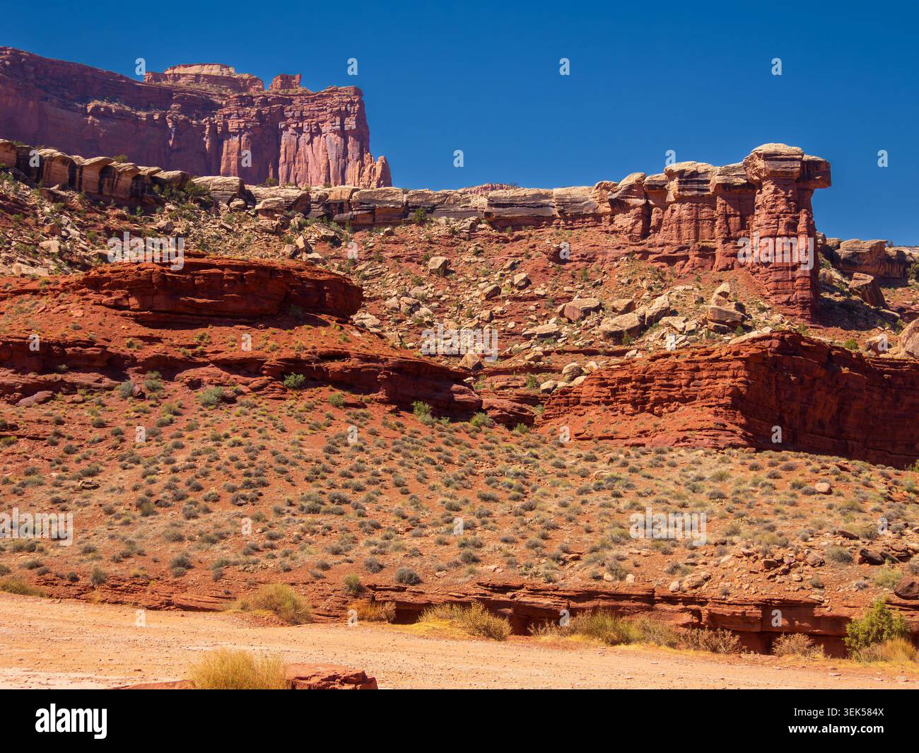 Moab, Utah May 15 2026 White capstones above red hoodoo columns ...