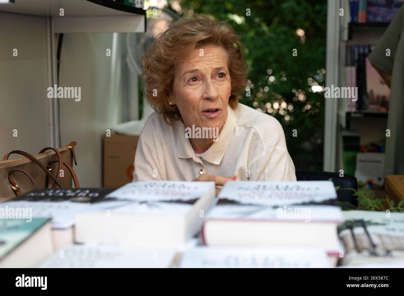 Author Julia Navarro signs copies of her books during the 85th edition ...