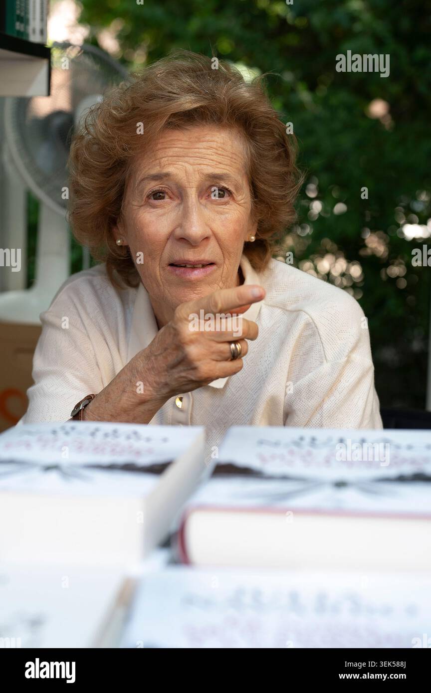 Author Julia Navarro signs copies of her books during the 85th edition ...