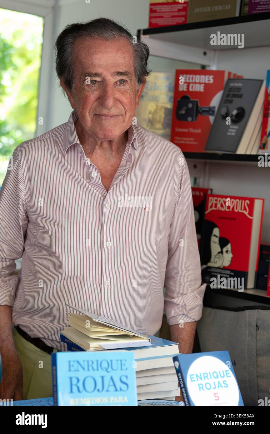 Author Enrique rojas signs copies of her books during the 85th edition ...