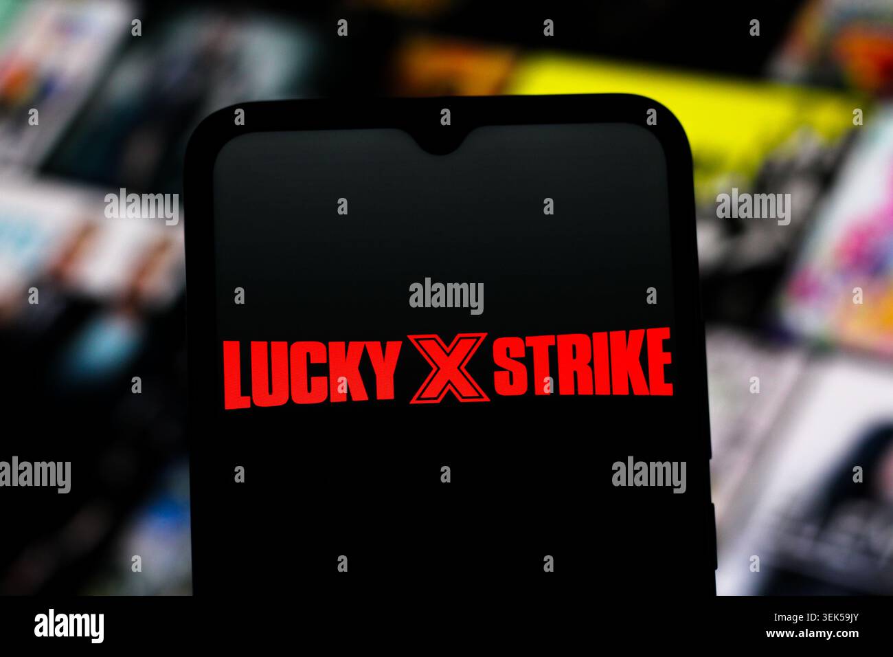 In this photo illustration, the Lucky Strike Entertainment logo is seen ...