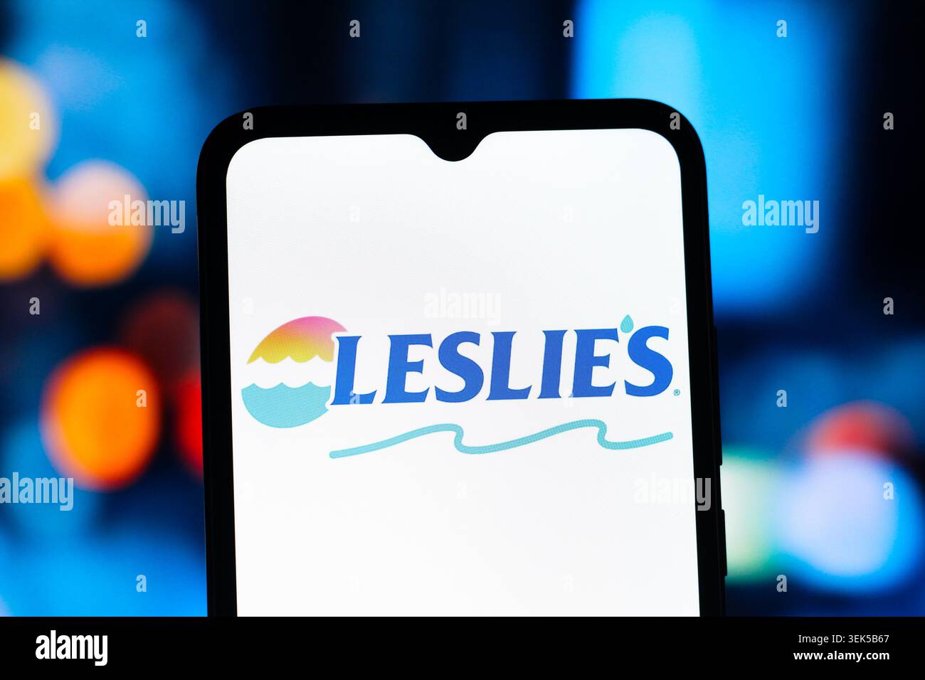 In this photo illustration, the Leslie's logo is seen displayed on a ...