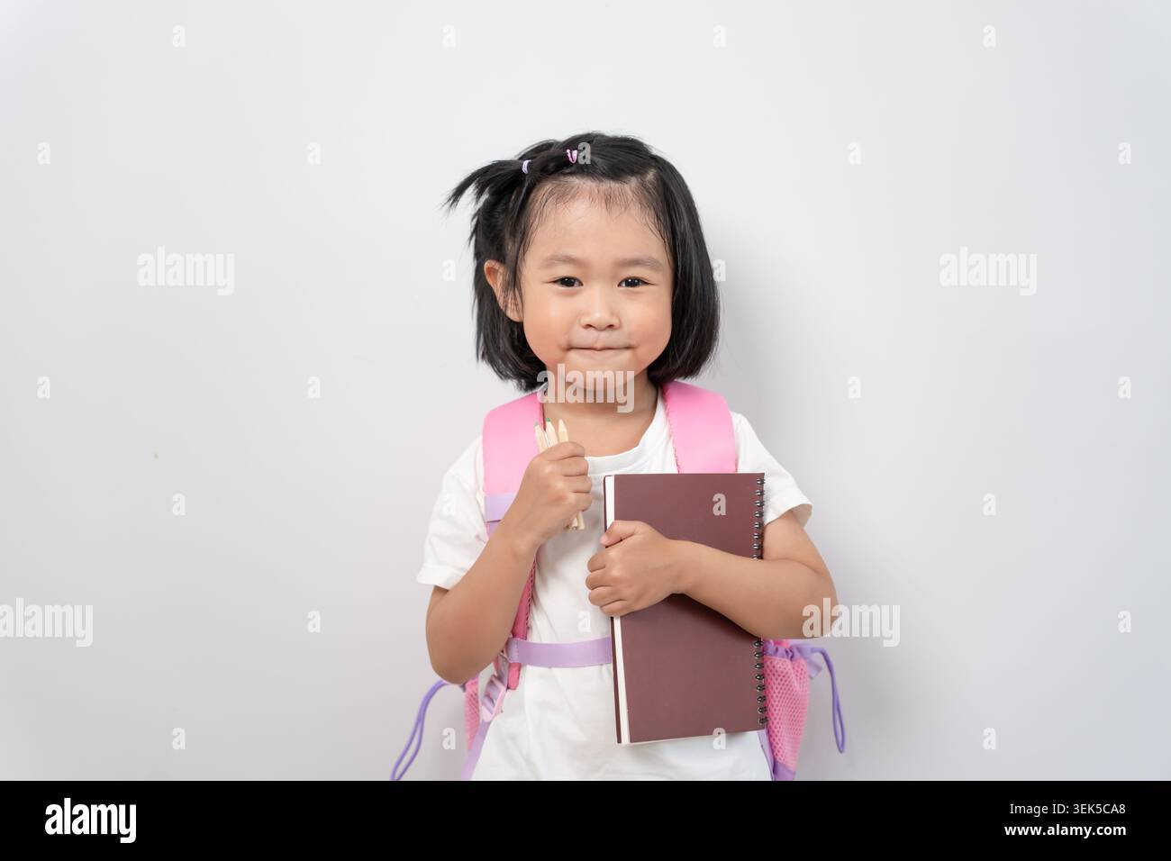 back to school, Asian promising child holding the School Supplies ...
