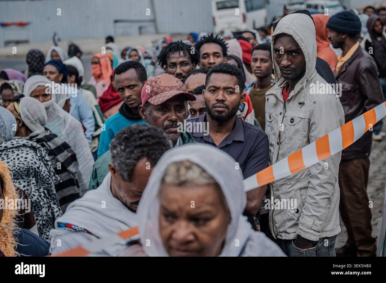 Ethiopian voters gather outside a polling station during the general ...