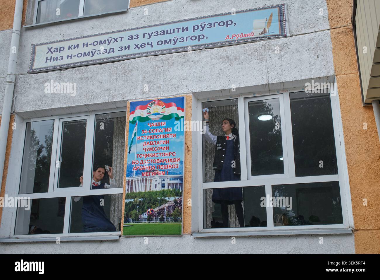 Students clean classroom windows ahead of a visit from a district ...