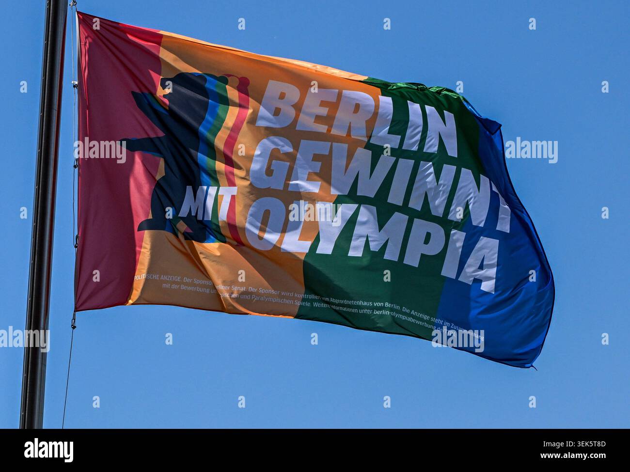 26 May 2026, Berlin: The Olympic flag flies in front of the Red City ...