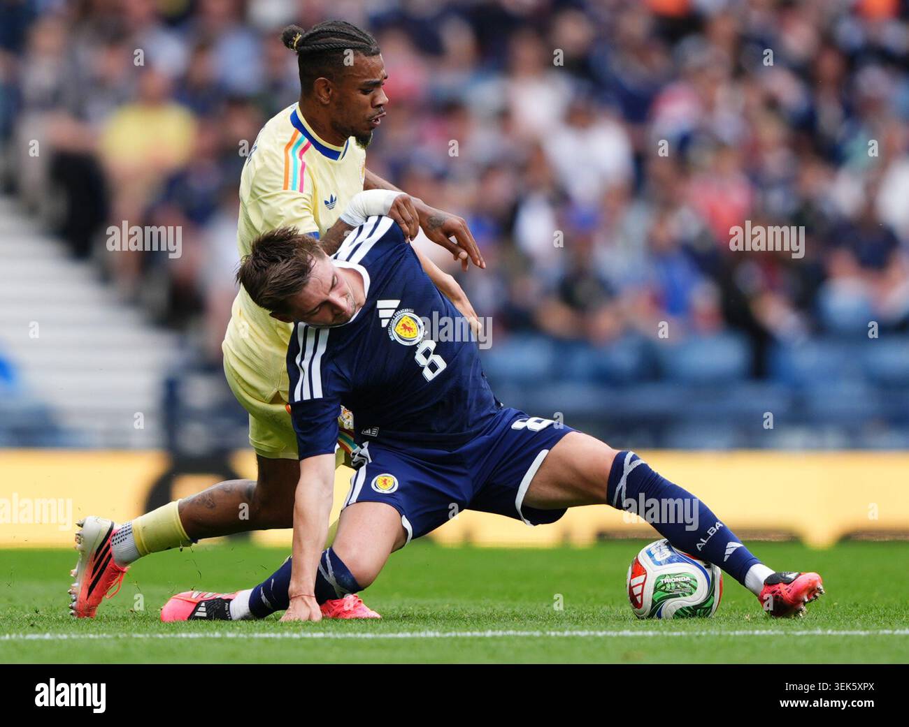 Scotland's Billy Gilmour is challenged by Curacao's Juninho Bacuna ...