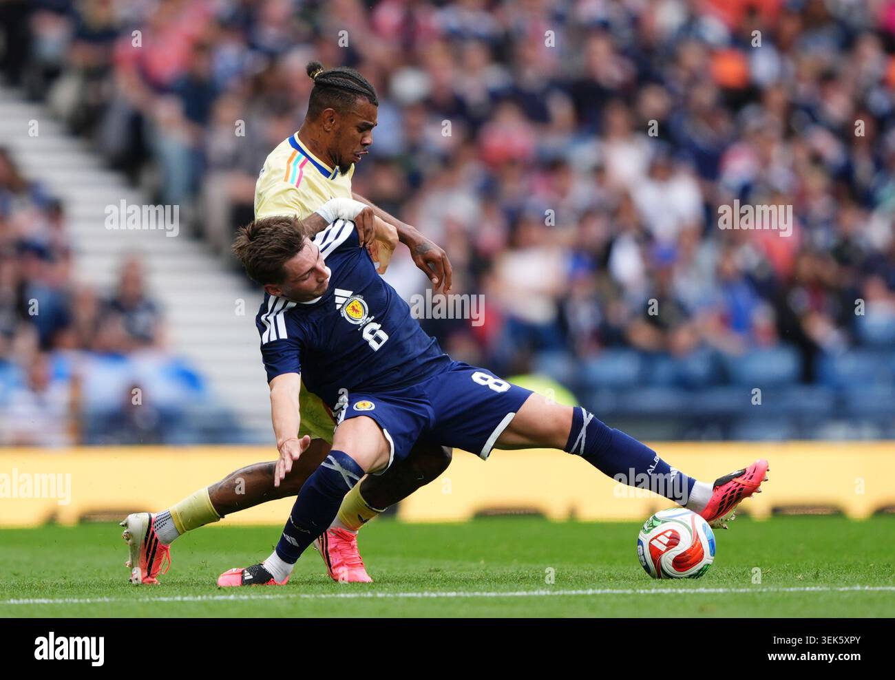 Scotland's Billy Gilmour is challenged by Curacao's Juninho Bacuna ...