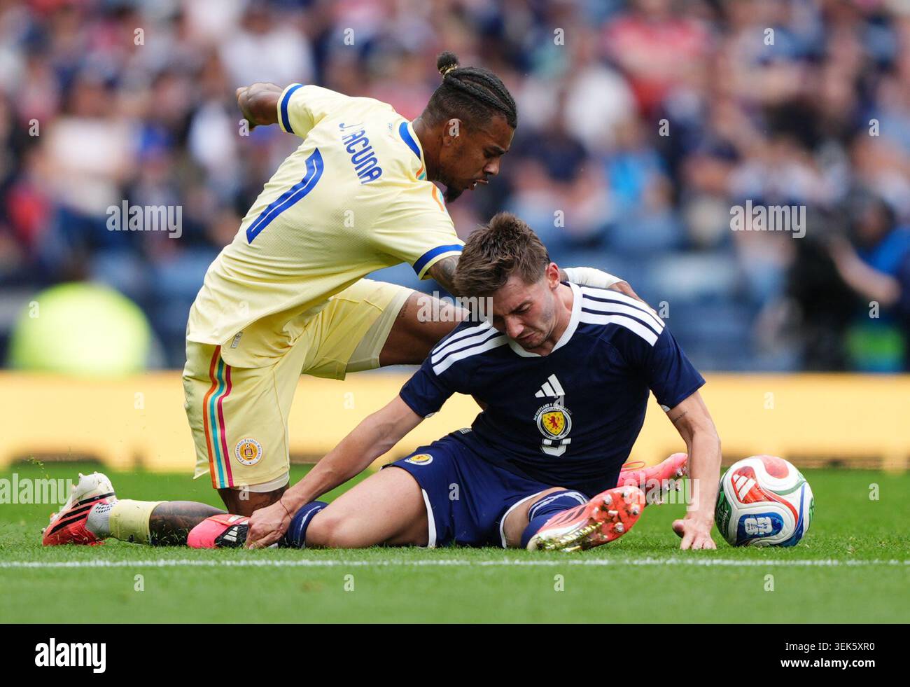 Scotland's Billy Gilmour is challenged by Curacao's Juninho Bacuna ...