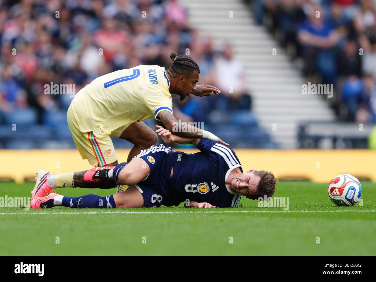 Scotland's Billy Gilmour is challenged by Curacao's Juninho Bacuna ...