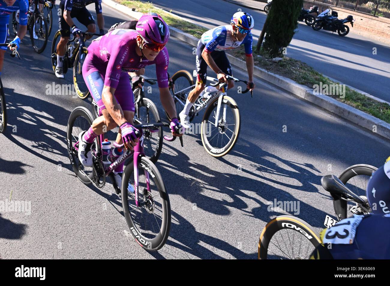 Paul Magnier (FRA) of Soudal Quickstep Team dressing the "Cyclamen ...