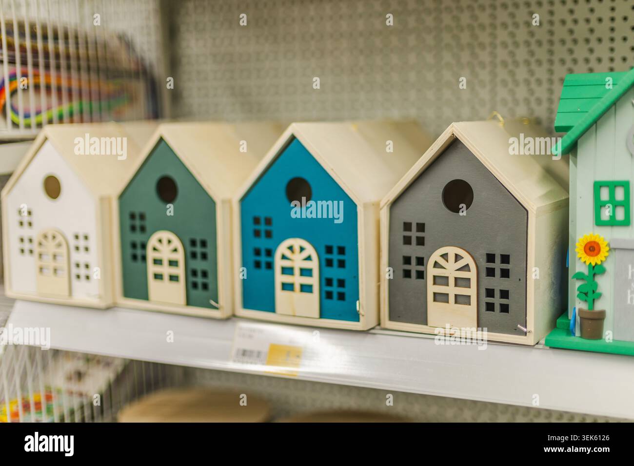 Dortmund, Germany, May 8, 2026: Decorative wooden birdhouses in ...