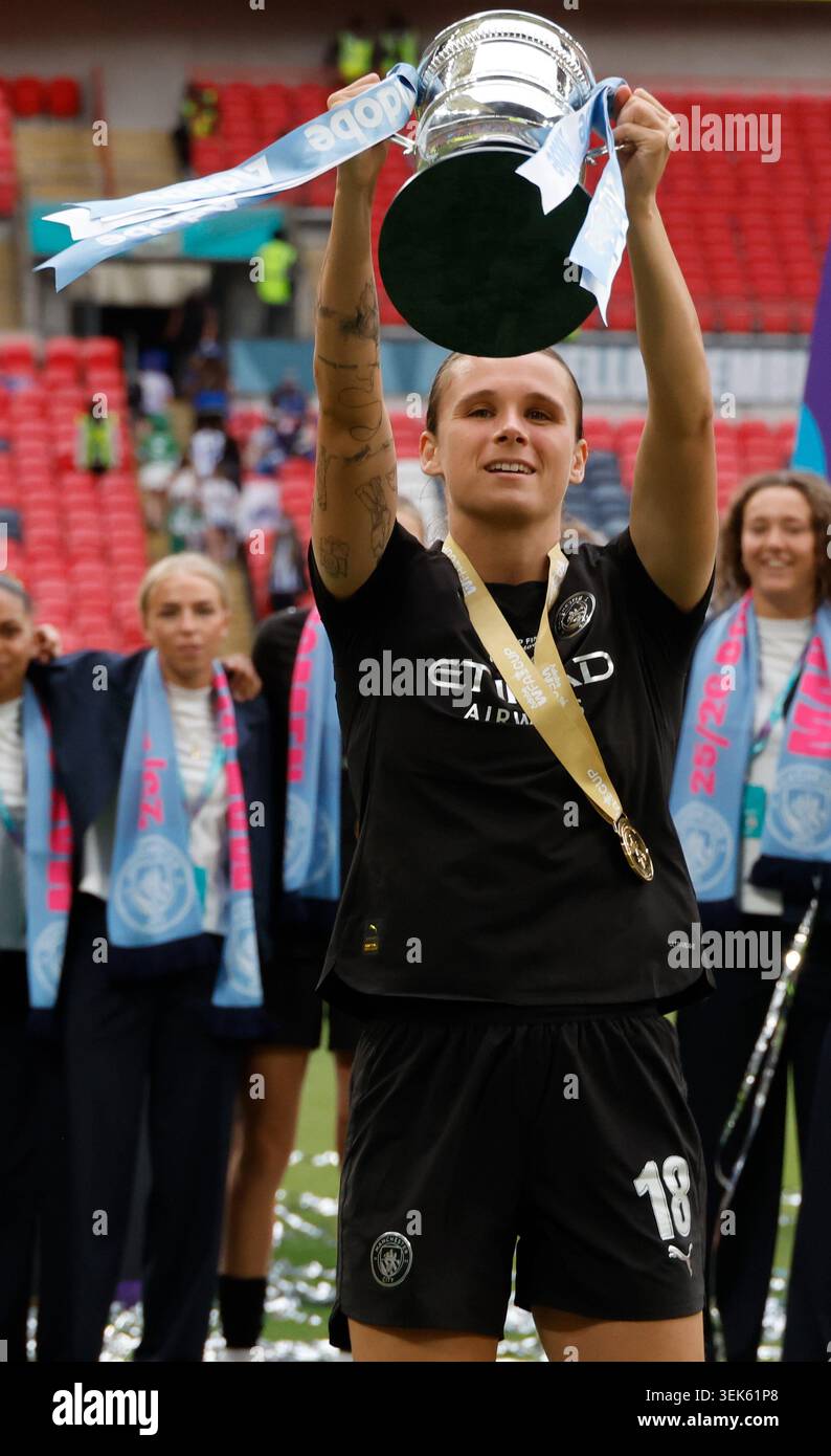LONDON, ENGLAND - Kerstin Casparij of Manchester City WFC with Trophy ...