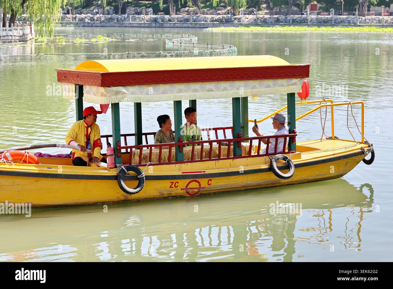 Tourists visit Beihai Park under scorching sun in Beijing, capital of ...
