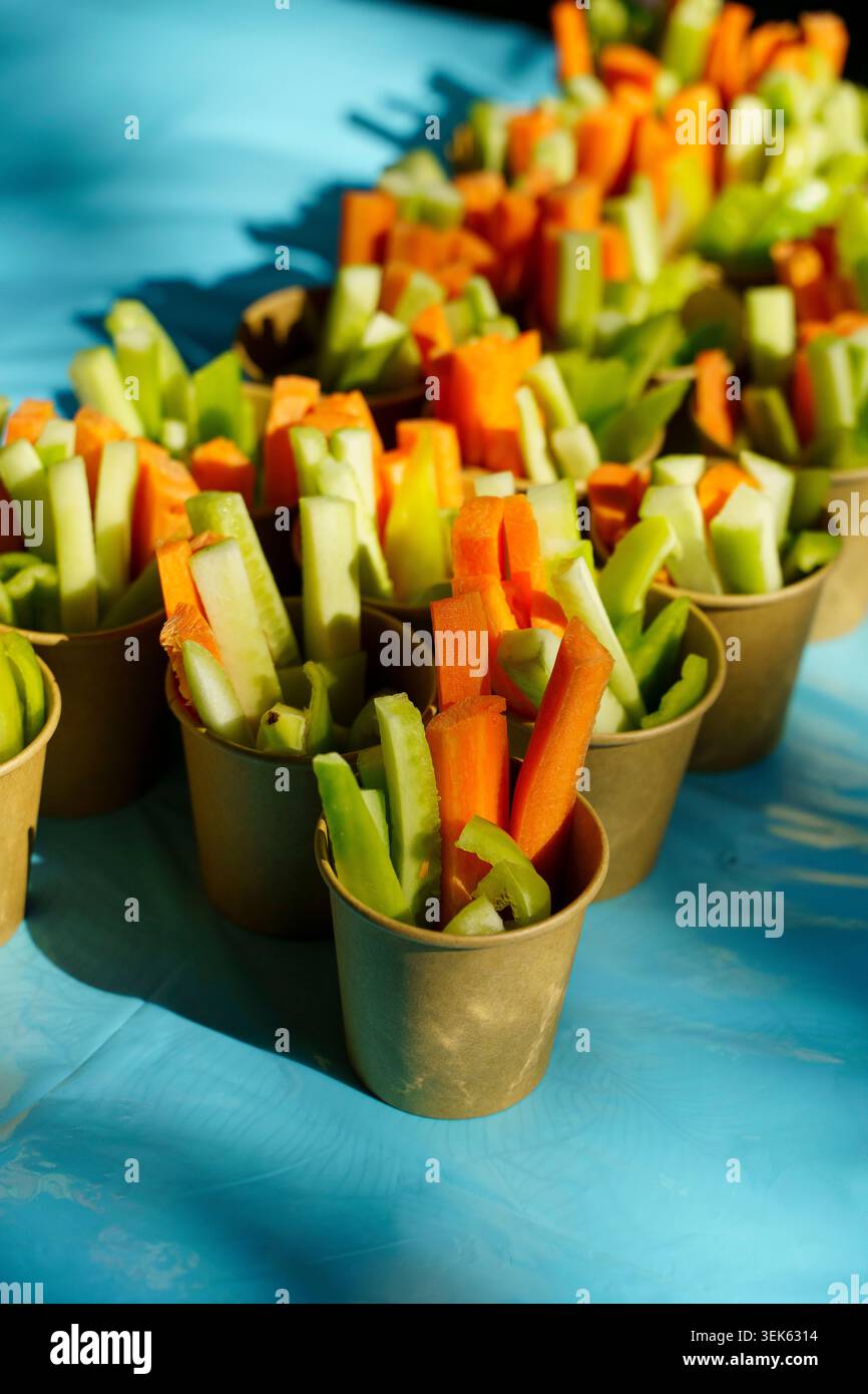 Healthy vegetable snacks in individual paper cups for kids' outdoor ...