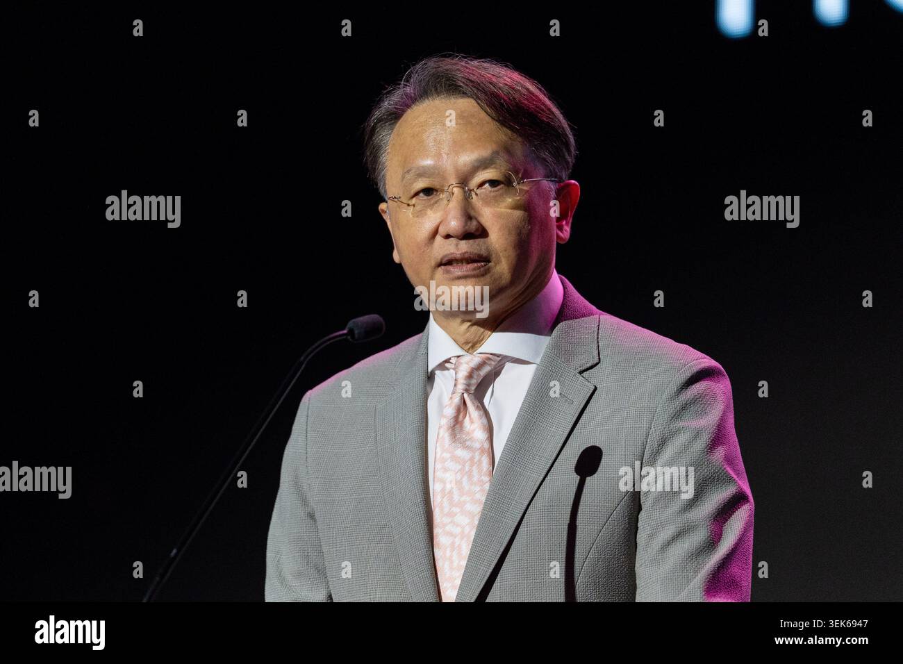 James Chen, Chairman of Taipei Computer Association speaking on stage ...
