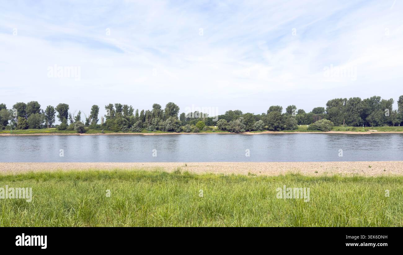 View on the scenic River Rhine in Duesseldorf Urdenbach Germany in ...