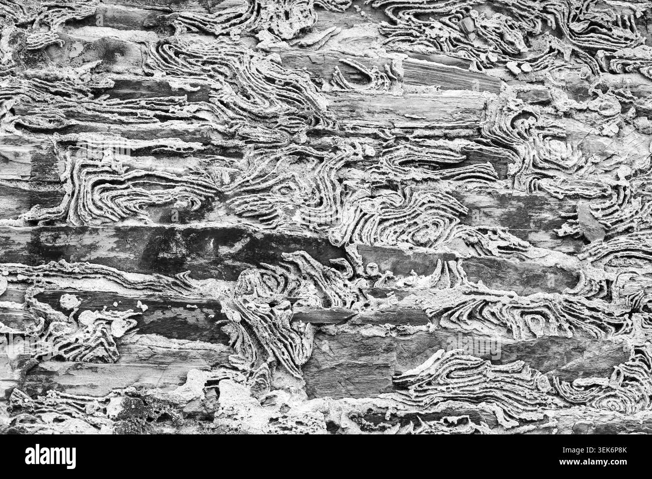 Wall peeling and exposing stone bricks in Spain Stock Photo - Alamy
