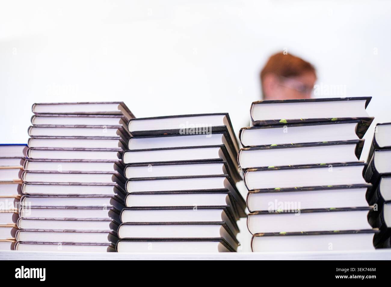 folded books and textbooks in piles. Education and book reading Stock ...