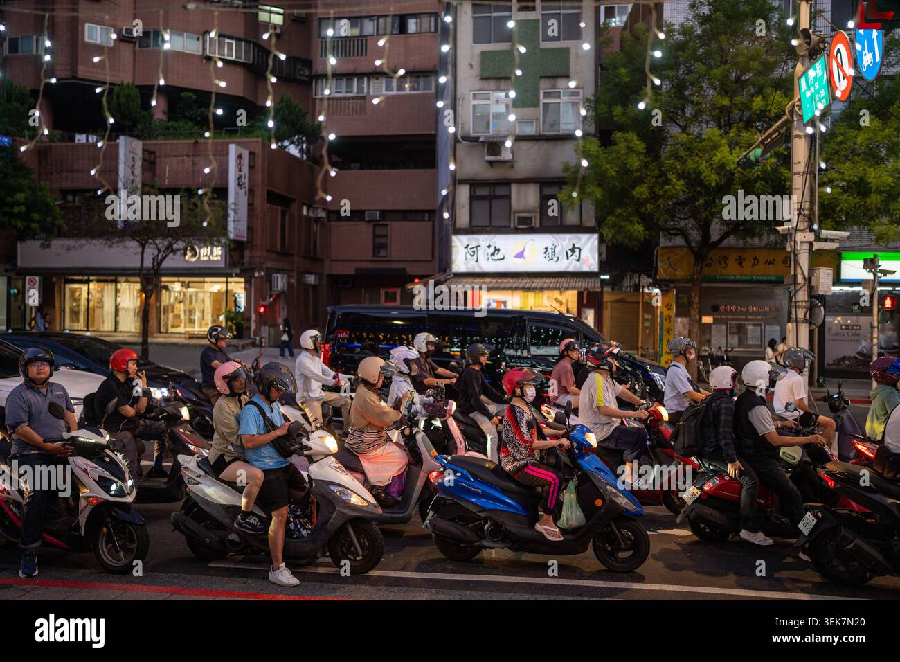 Motorcycles at a traffic light in Taipei, Taiwan, June 1, 2026. NEXPHER ...