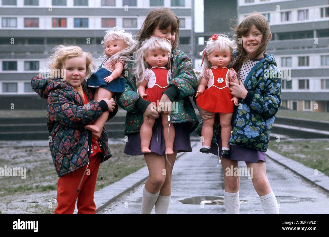 File - Three little girls with their dolls are pictured in the Catholic ...