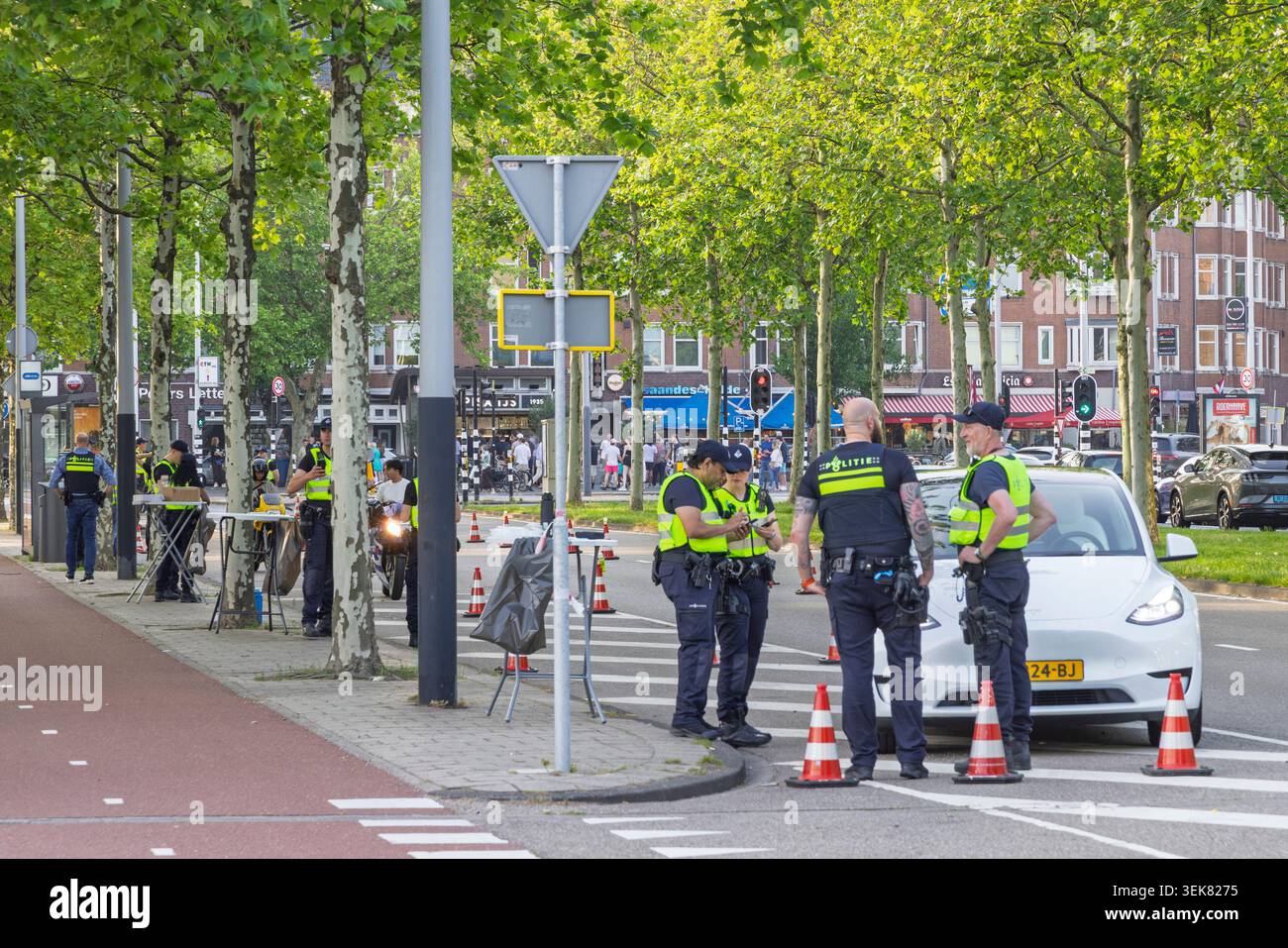 Amsterdam, Netherlands - 23 May 2026: Police officers in high ...