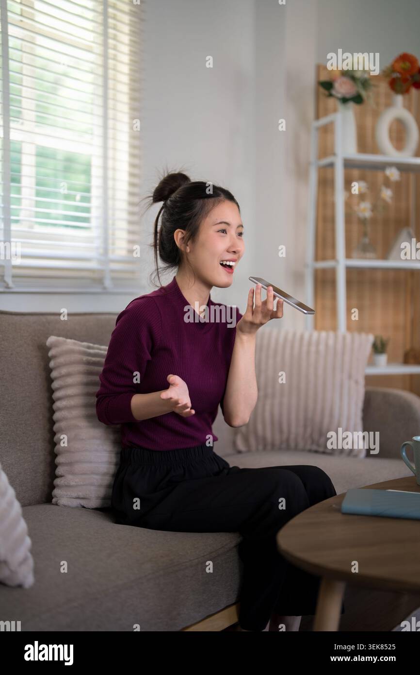Asian women talking smartphone voice assistant communication technology ...