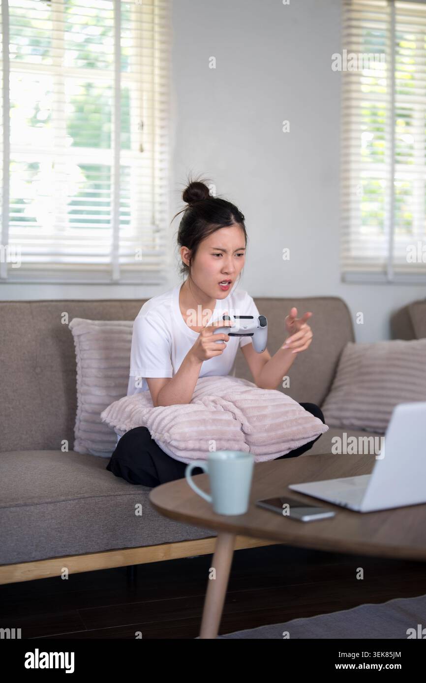 Asian women using laptop computer video call consultation talking ...