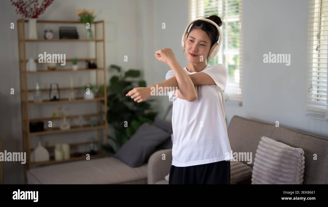 Young Asian women stretching arm shoulder muscle warmup exercise ...