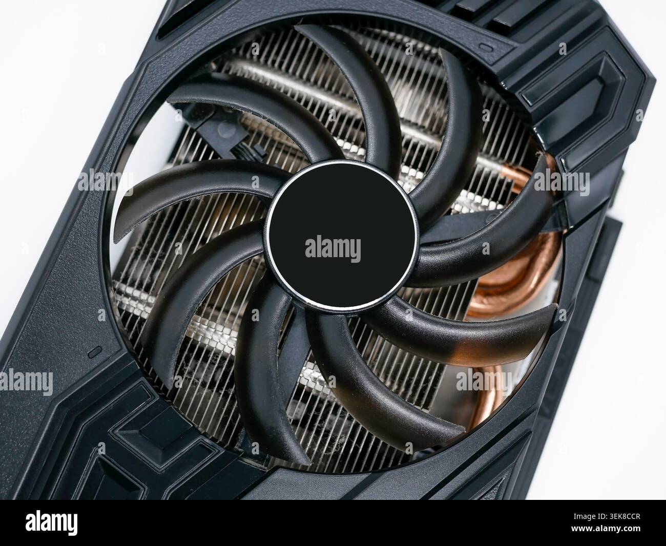 Modern graphics card with fan cooler macro on white background ...
