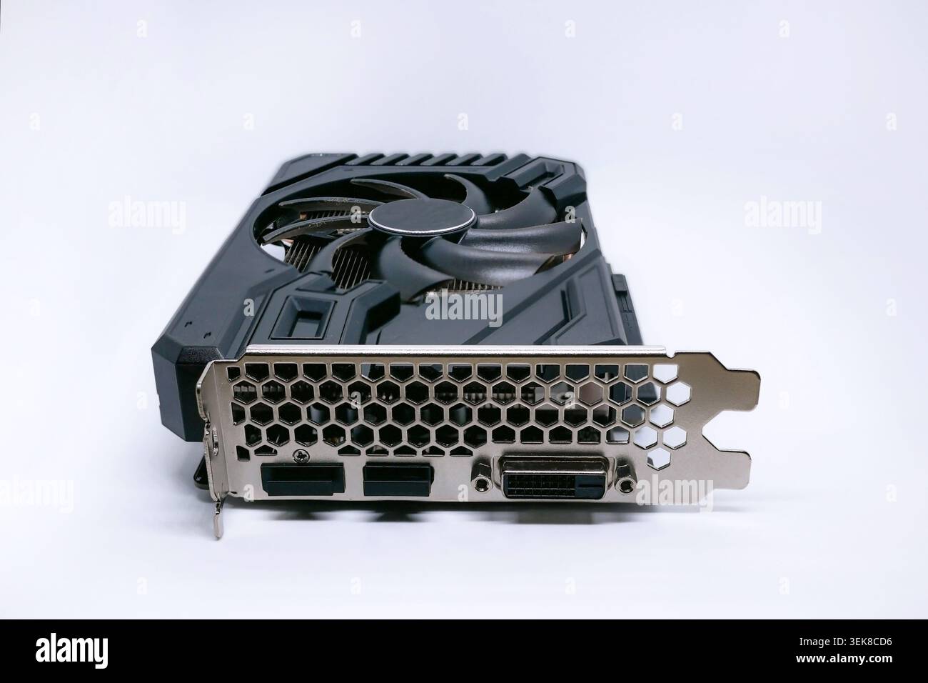 Modern graphics card with fan cooler on white background. Computer ...