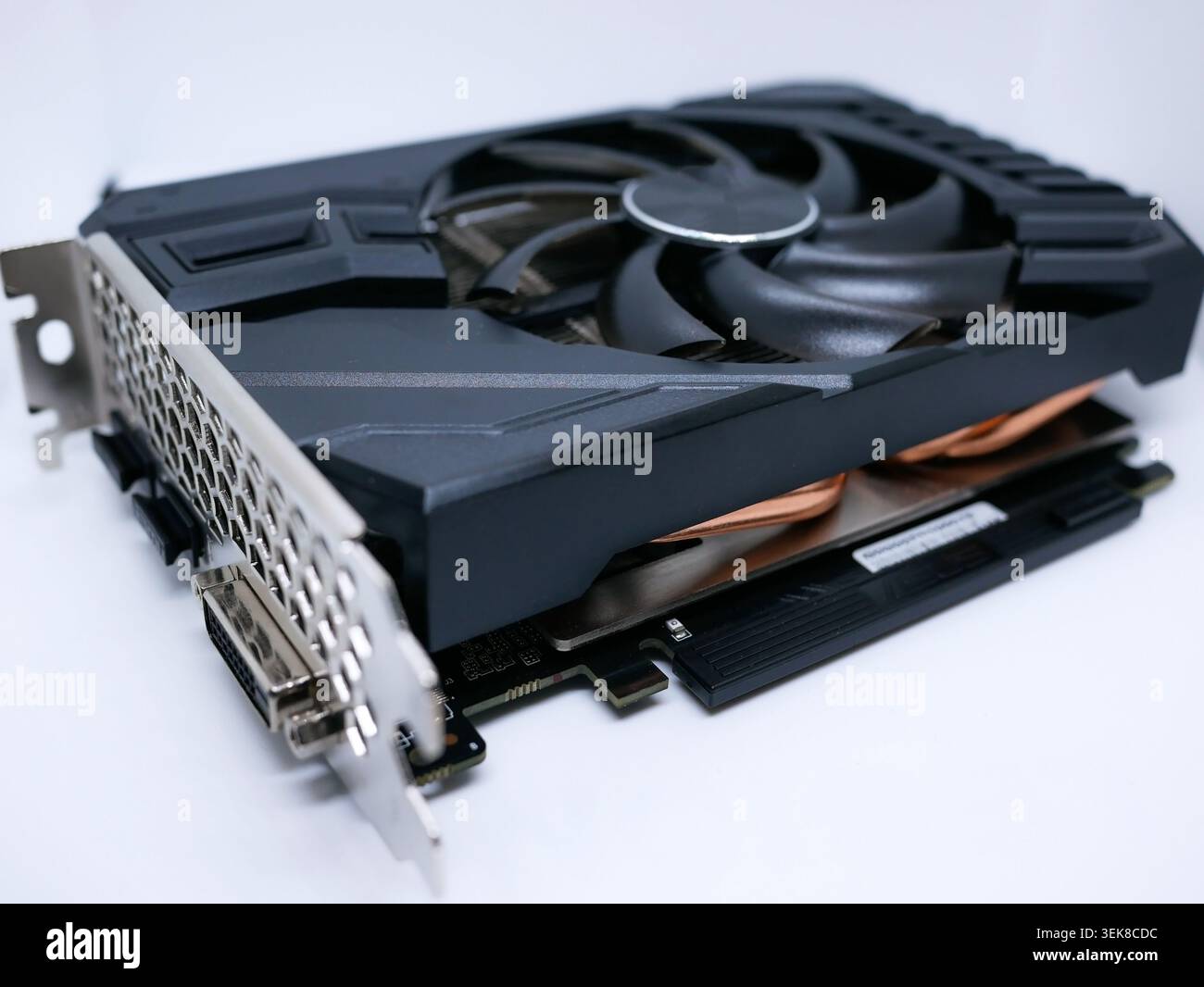 Modern graphics card with fan cooler on white background. Computer ...